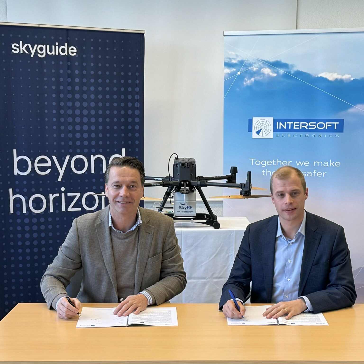 Skyguide and Intersoft Electronics Services sign cooperation agreement for CNS Drone SkyRF - CANSO
